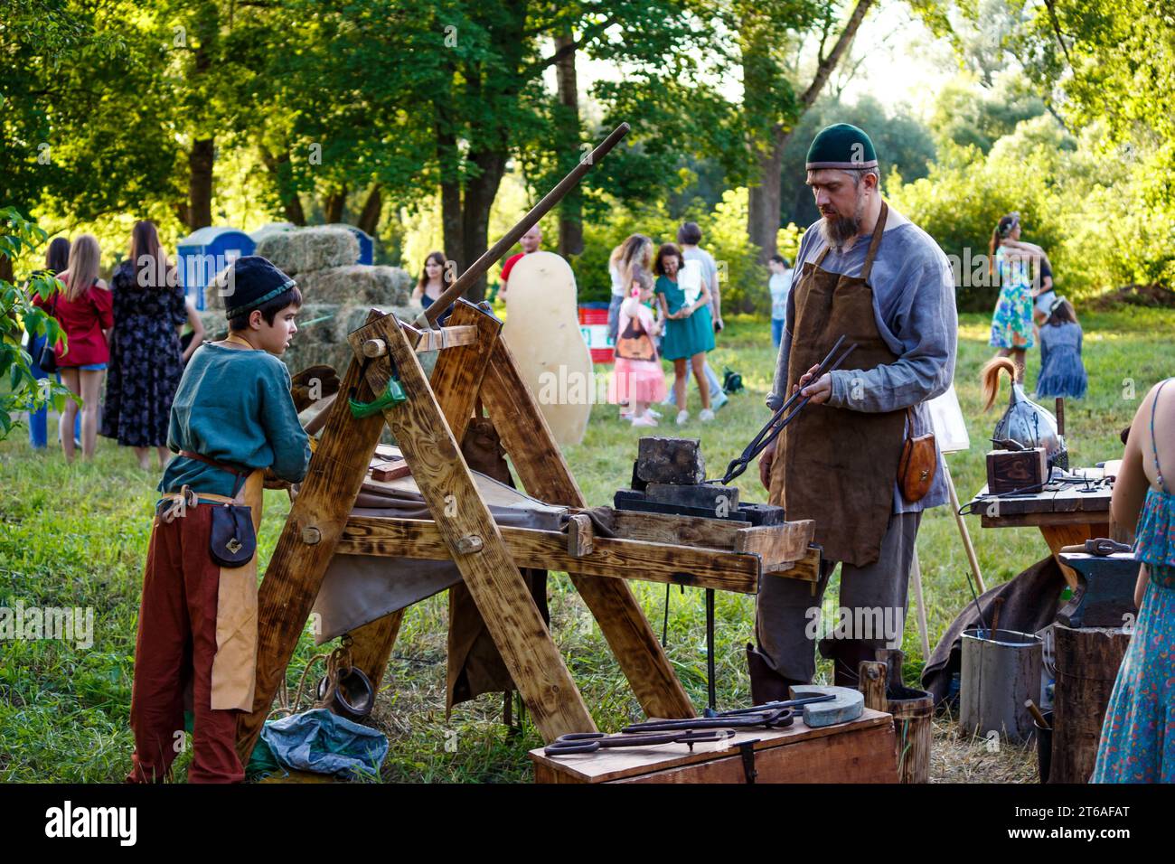 Reconstruction of a medieval forge at a historical festival: Kaluzhskiy ...