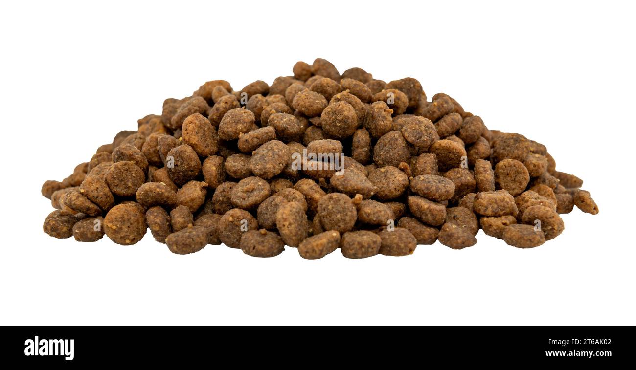 A slide of dry dog food on a white background. Food for dogs and cats ...