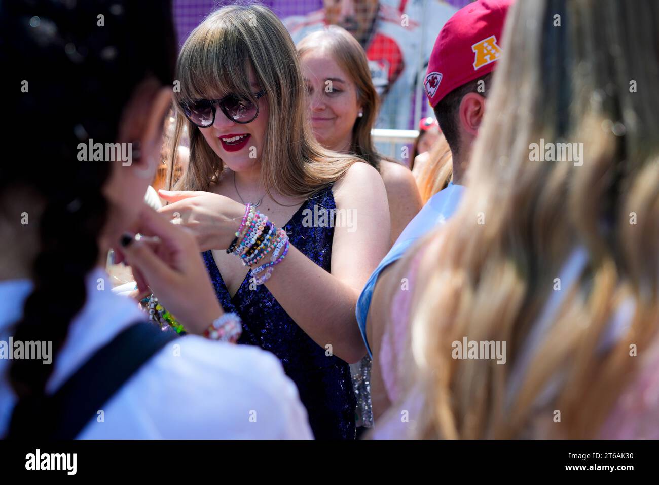 Fans of Taylor Swift wait for the doors of Monumental stadium to open ...