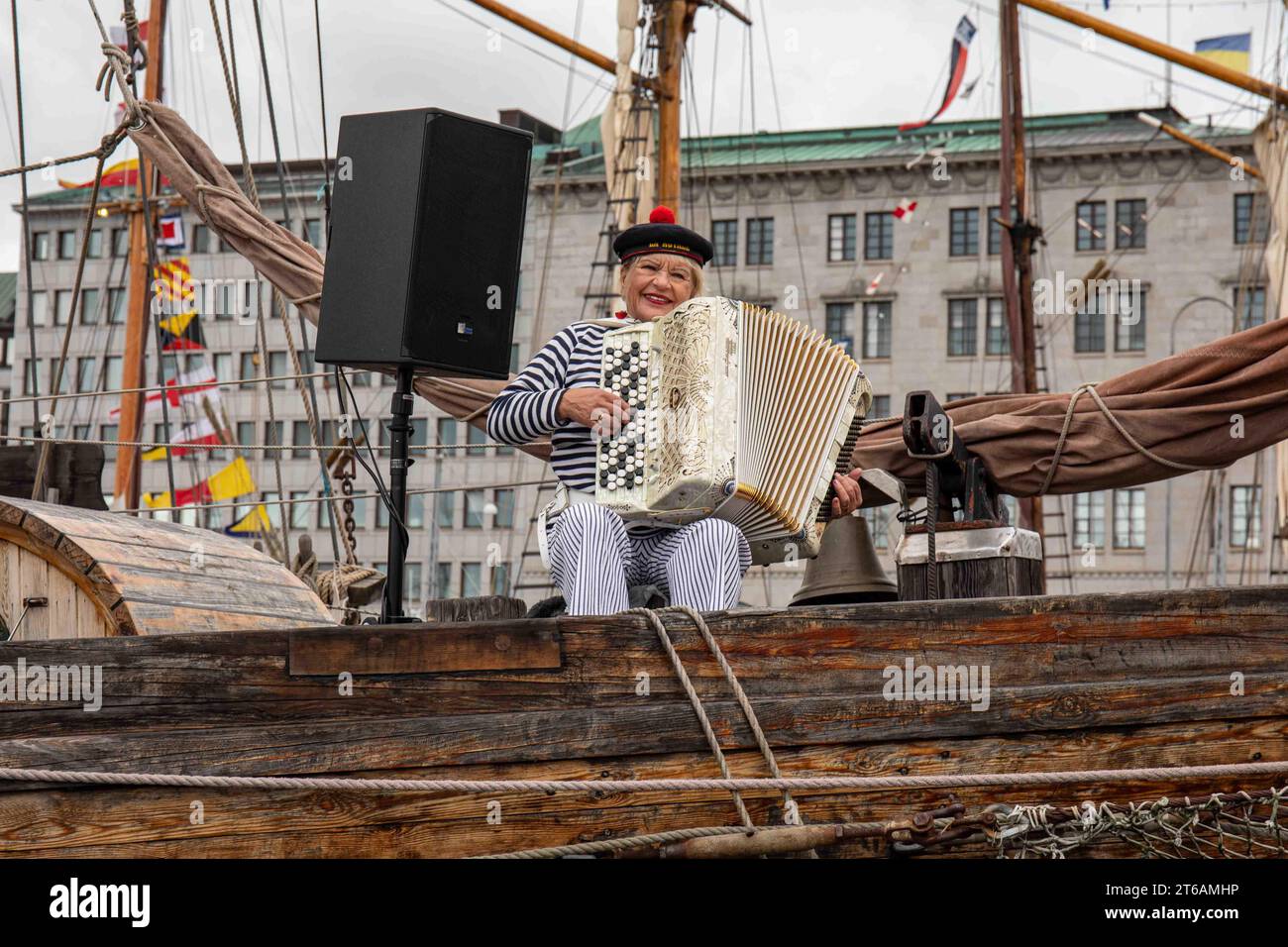 Accordion player on the deck of a sailing ship at Stadin ...