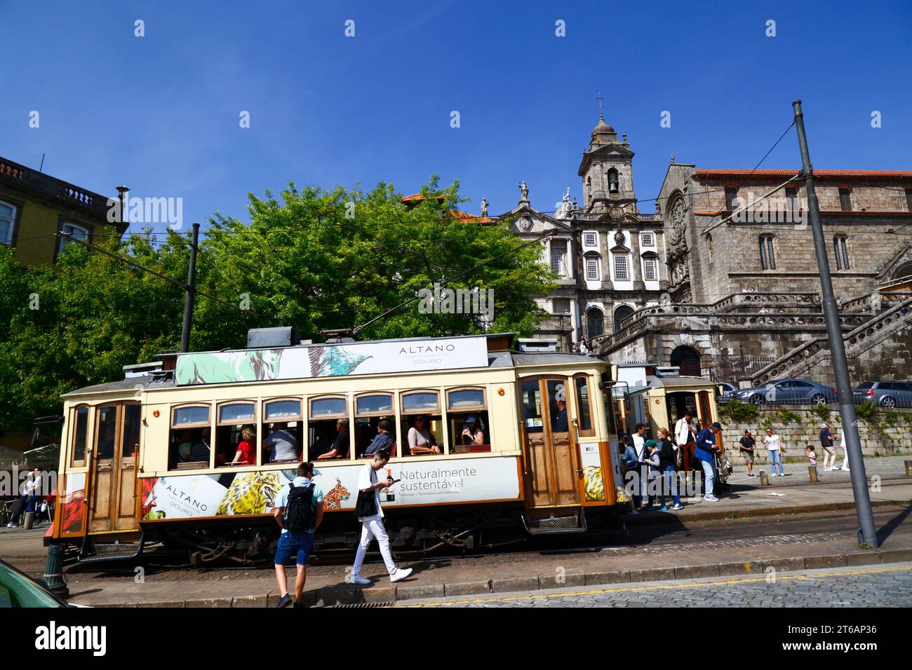 Old fashioned tram at Infante station, San Francisco church in ...