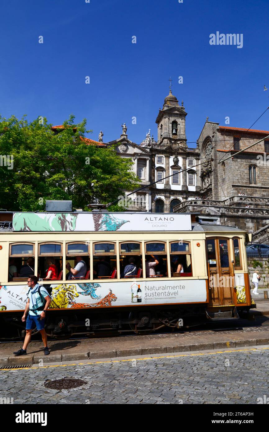 Old fashioned tram at Infante station, San Francisco church in ...