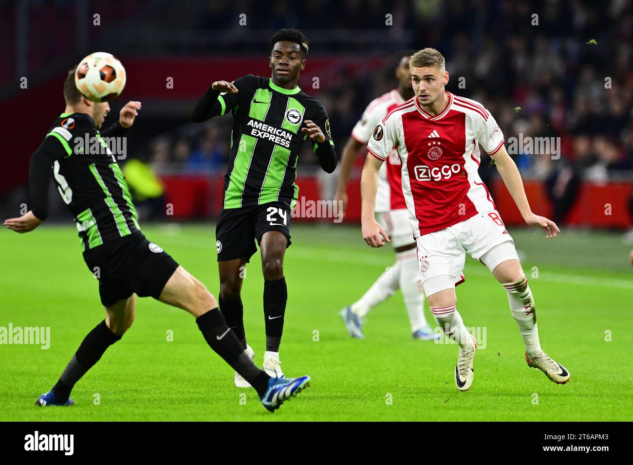 AMSTERDAM - (l-r) Simon Adingra of Brighton Hove Albion, Kenneth Taylor ...