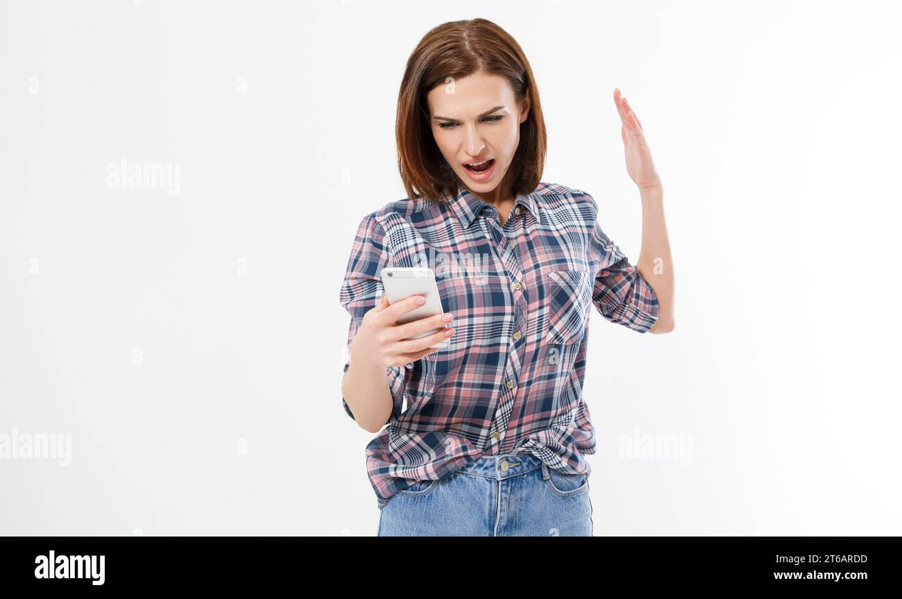 Shocked frustrated young woman with phone. Female with anger on cell ...