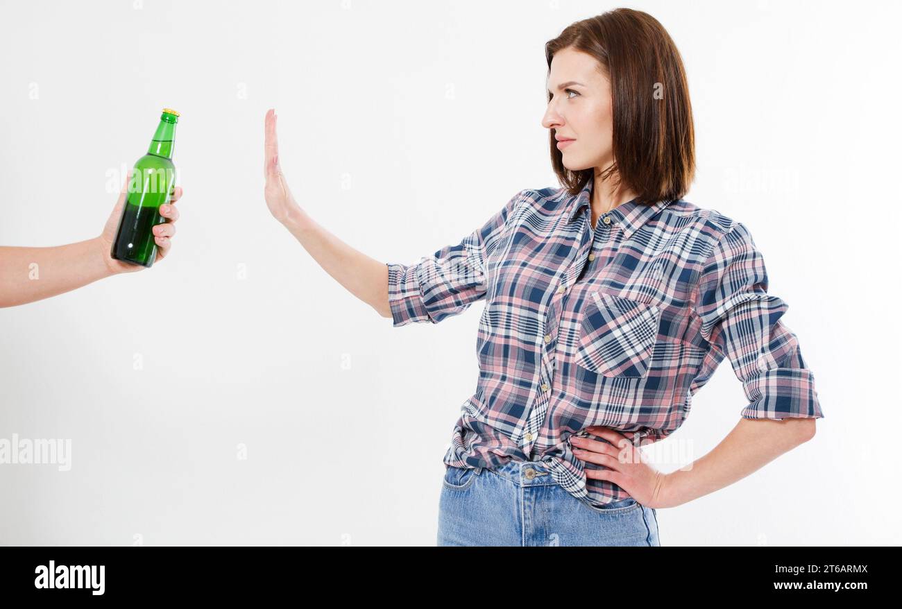 woman rejected alcohol bottle isolated on white background,female ...
