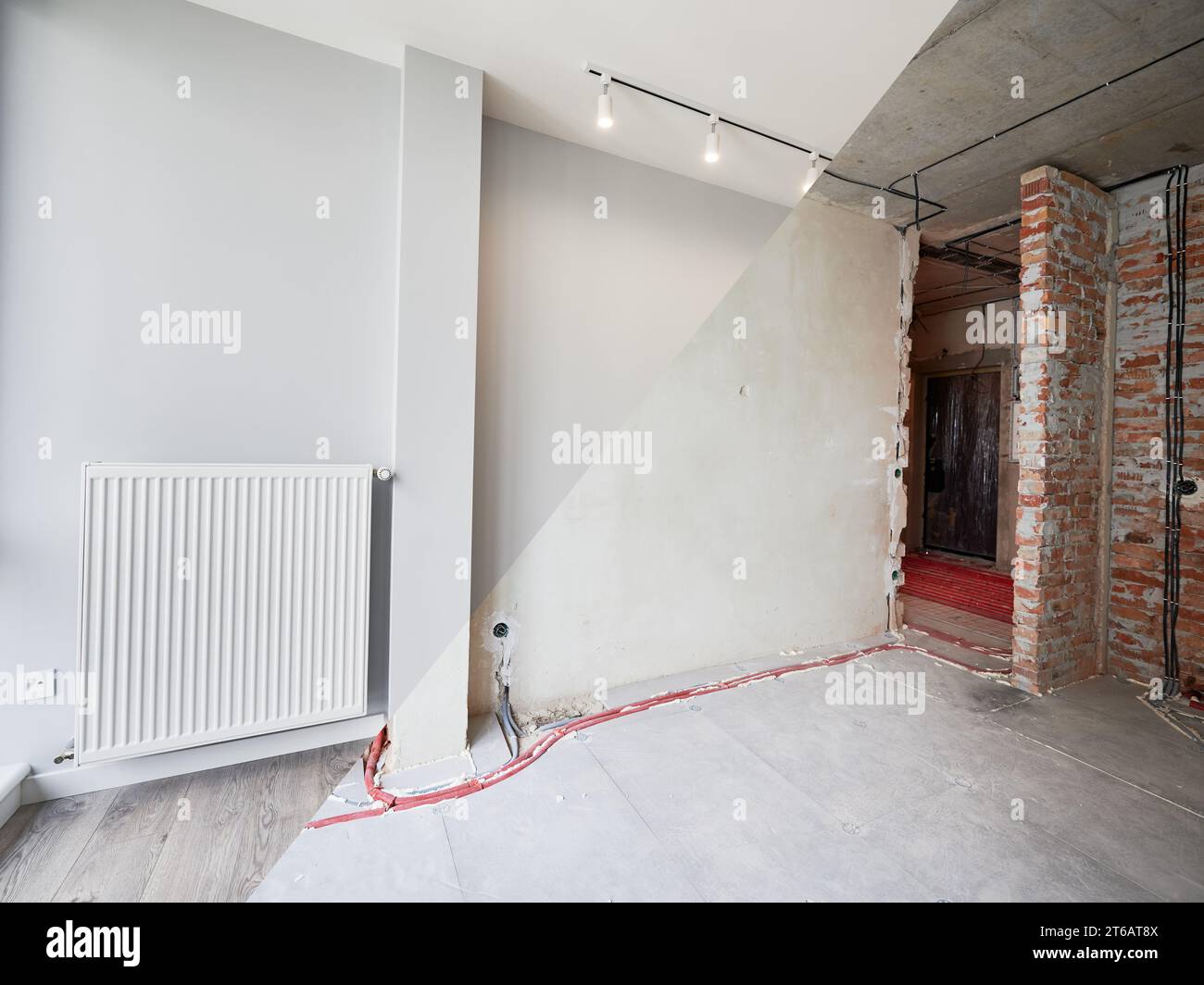 Empty living room with installed heating system before and after ...