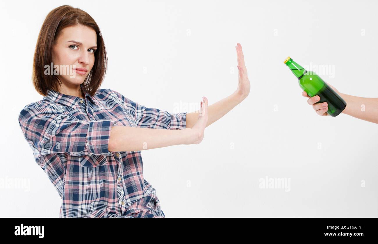 No bad habits: Woman rejaction alcohol drink isolated over white ...