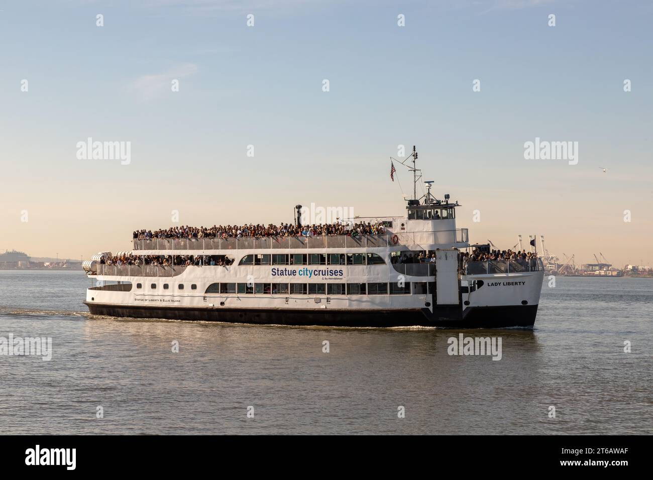 Statue Cruises passenger ferry Lady Liberty. Transporting tourists to ...