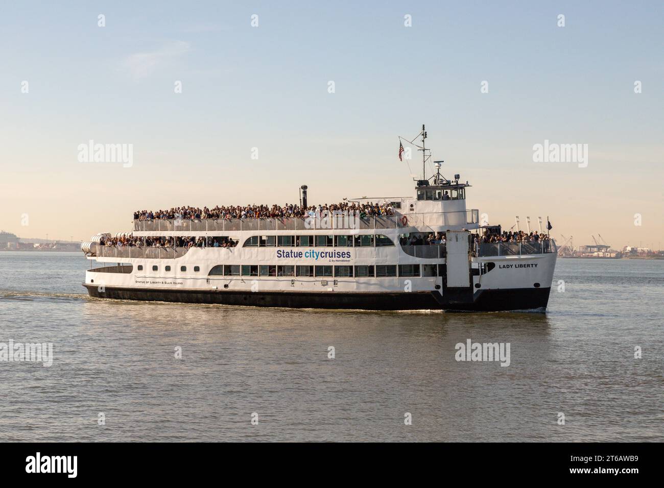 Statue Cruises passenger ferry Lady Liberty. Transporting tourists to ...