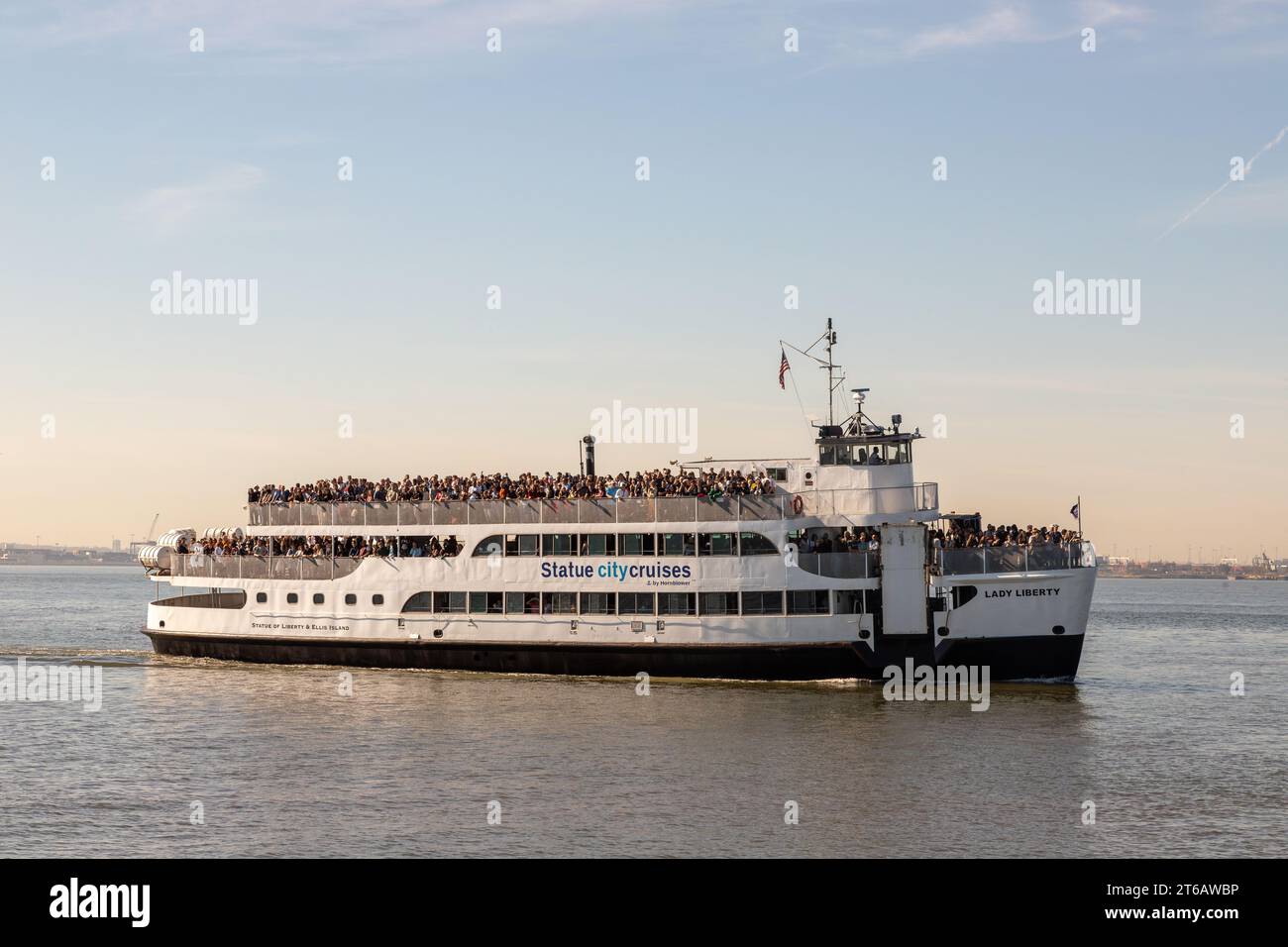Statue Cruises passenger ferry Lady Liberty. Transporting tourists to ...