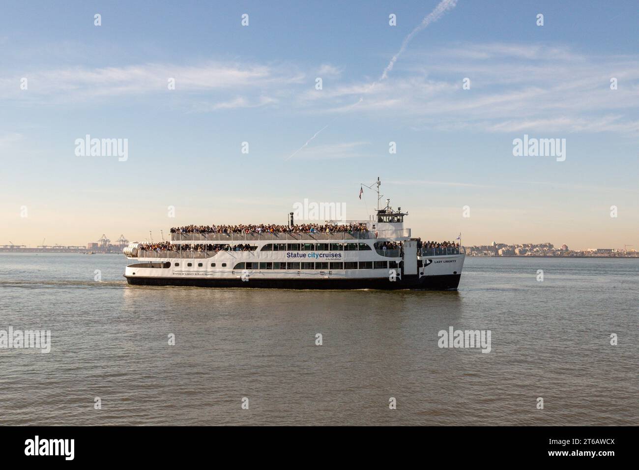 Statue Cruises passenger ferry Lady Liberty. Transporting tourists to ...