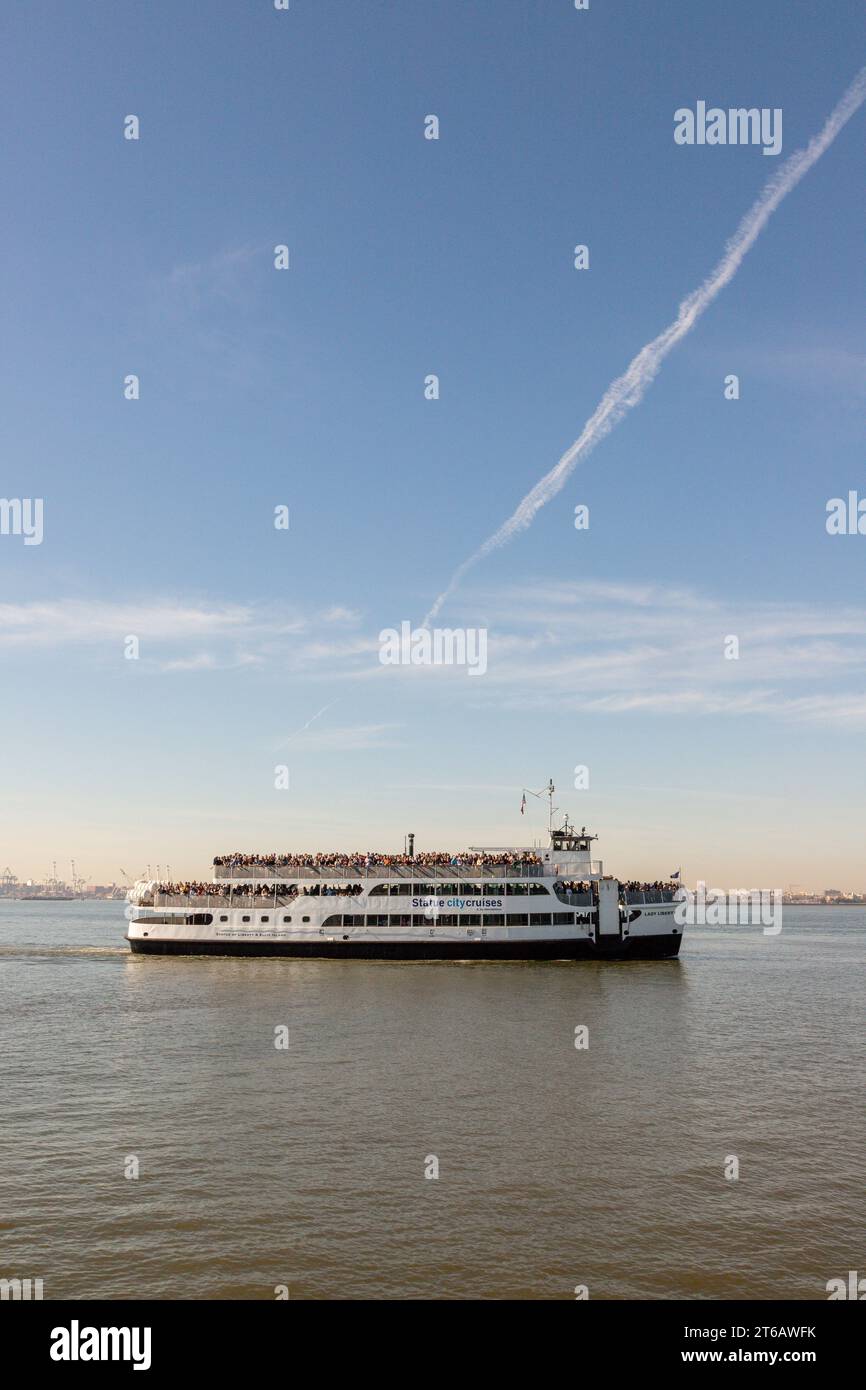 Statue Cruises passenger ferry Lady Liberty. Transporting tourists to ...