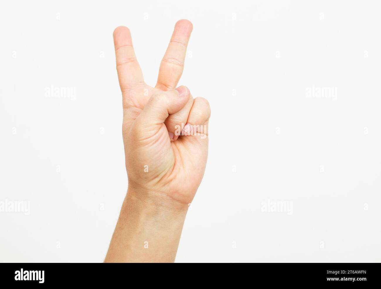 man hand victory sign gesture isolated on white background Stock Photo ...