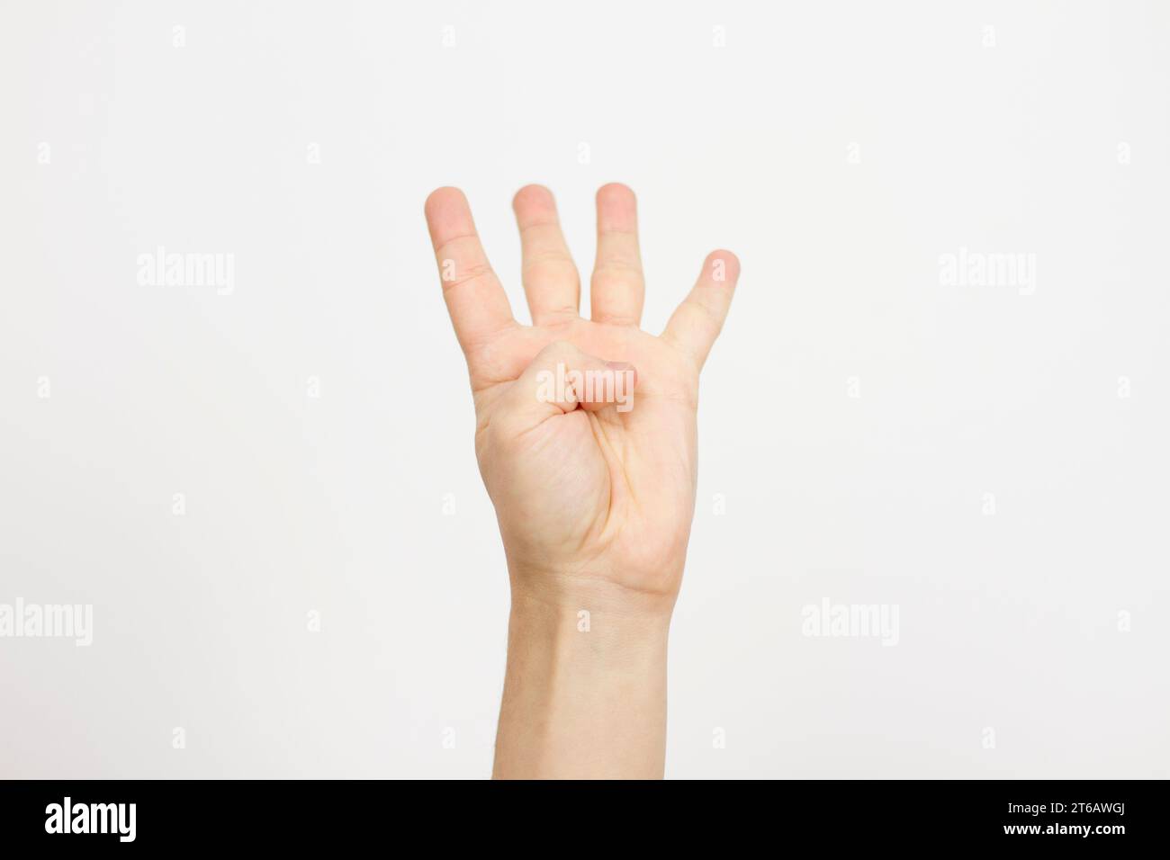 hand showing number four on white background, closeup. Sign language ...
