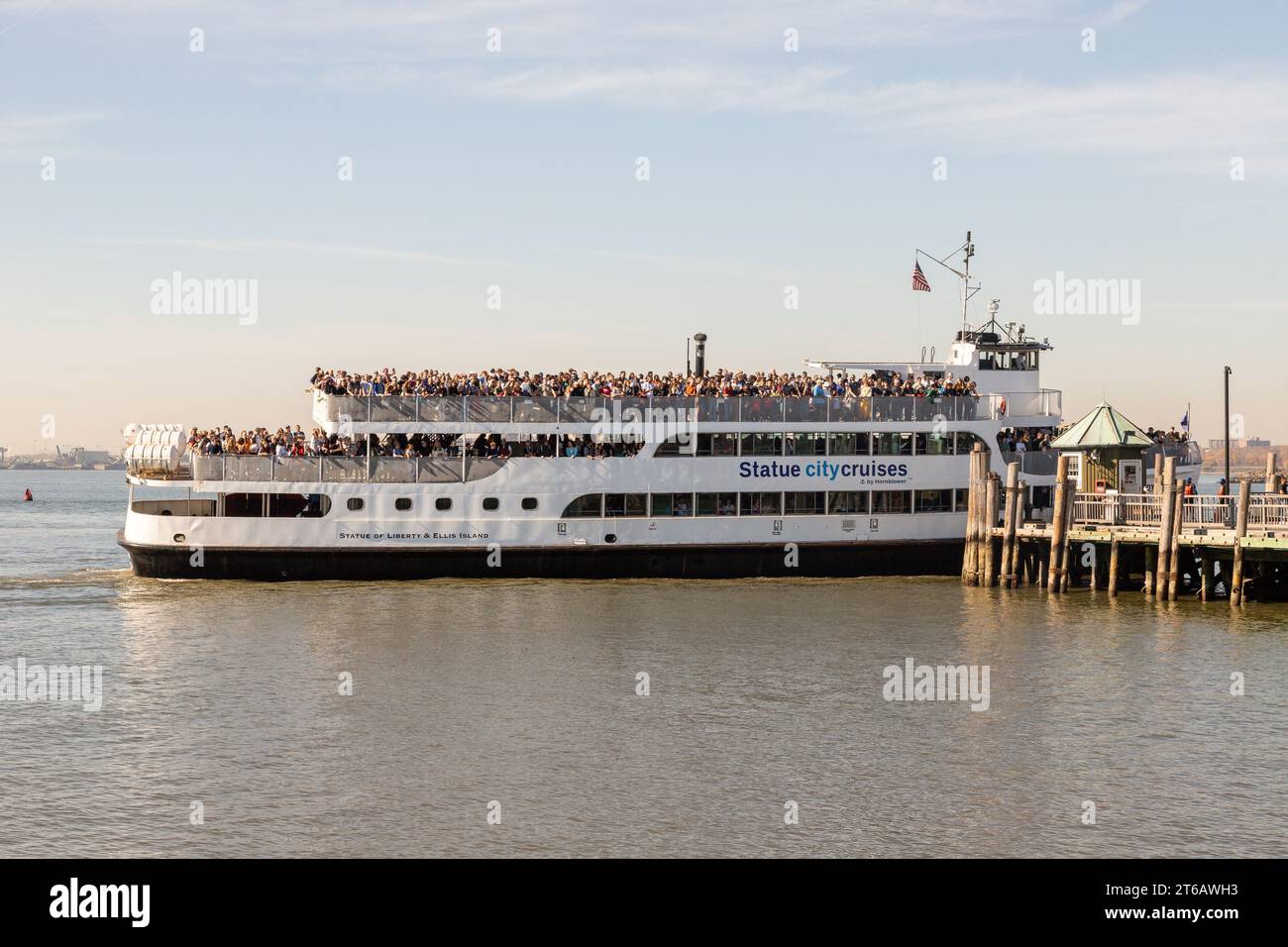 Statue Cruises passenger ferry Lady Liberty. Transporting tourists to ...