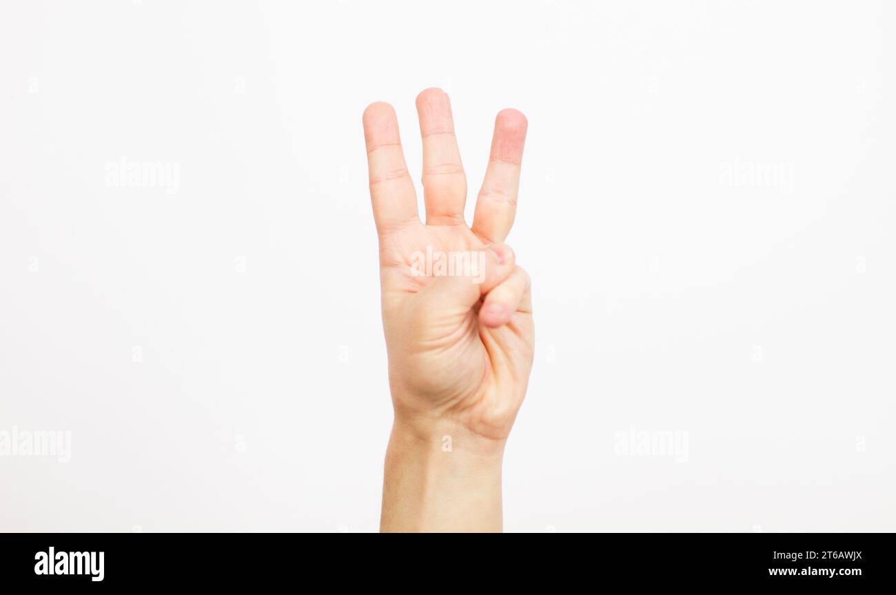 hand is showing three fingers isolated on white background Stock Photo ...