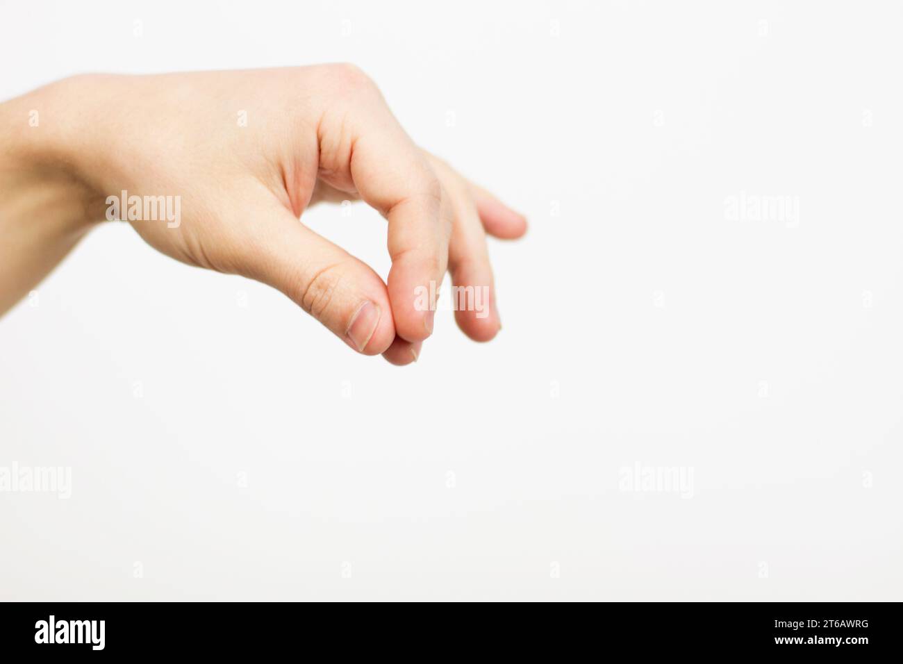 Empty hand making gesture like holding something isolated at white ...