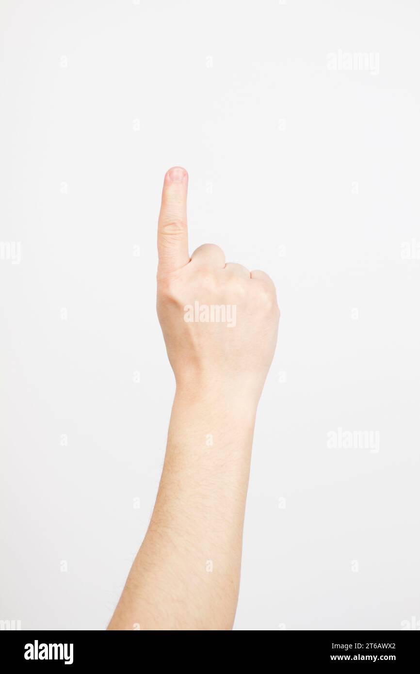 man's hand show sign one isolated on white background Stock Photo - Alamy