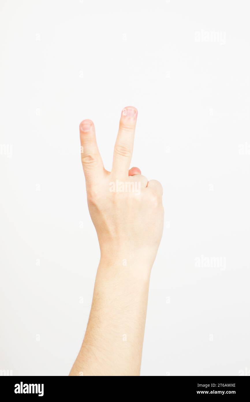 two fingers up isolated or number two isolated Stock Photo - Alamy
