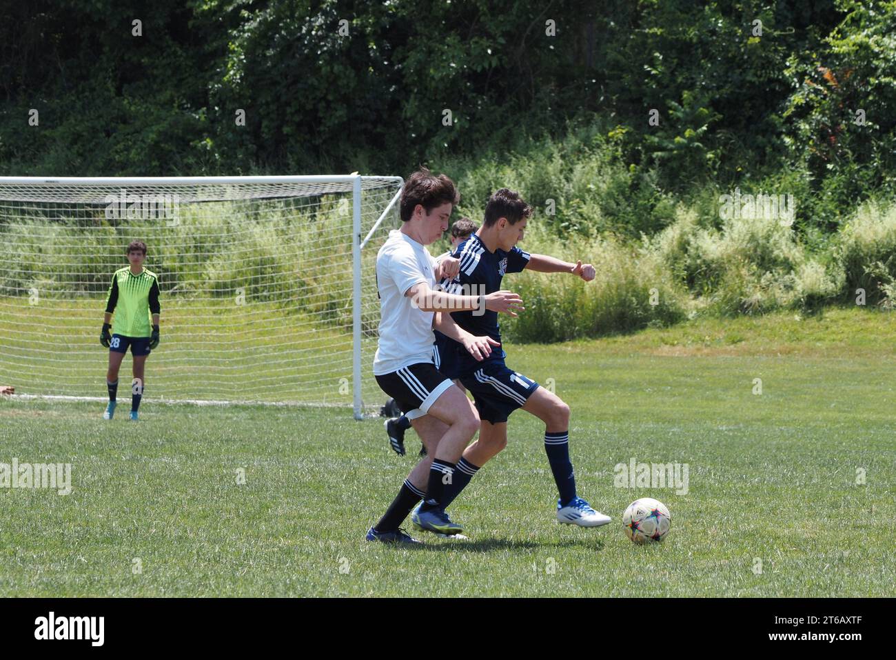 Teenage boys playing Soccer Stock Photo - Alamy