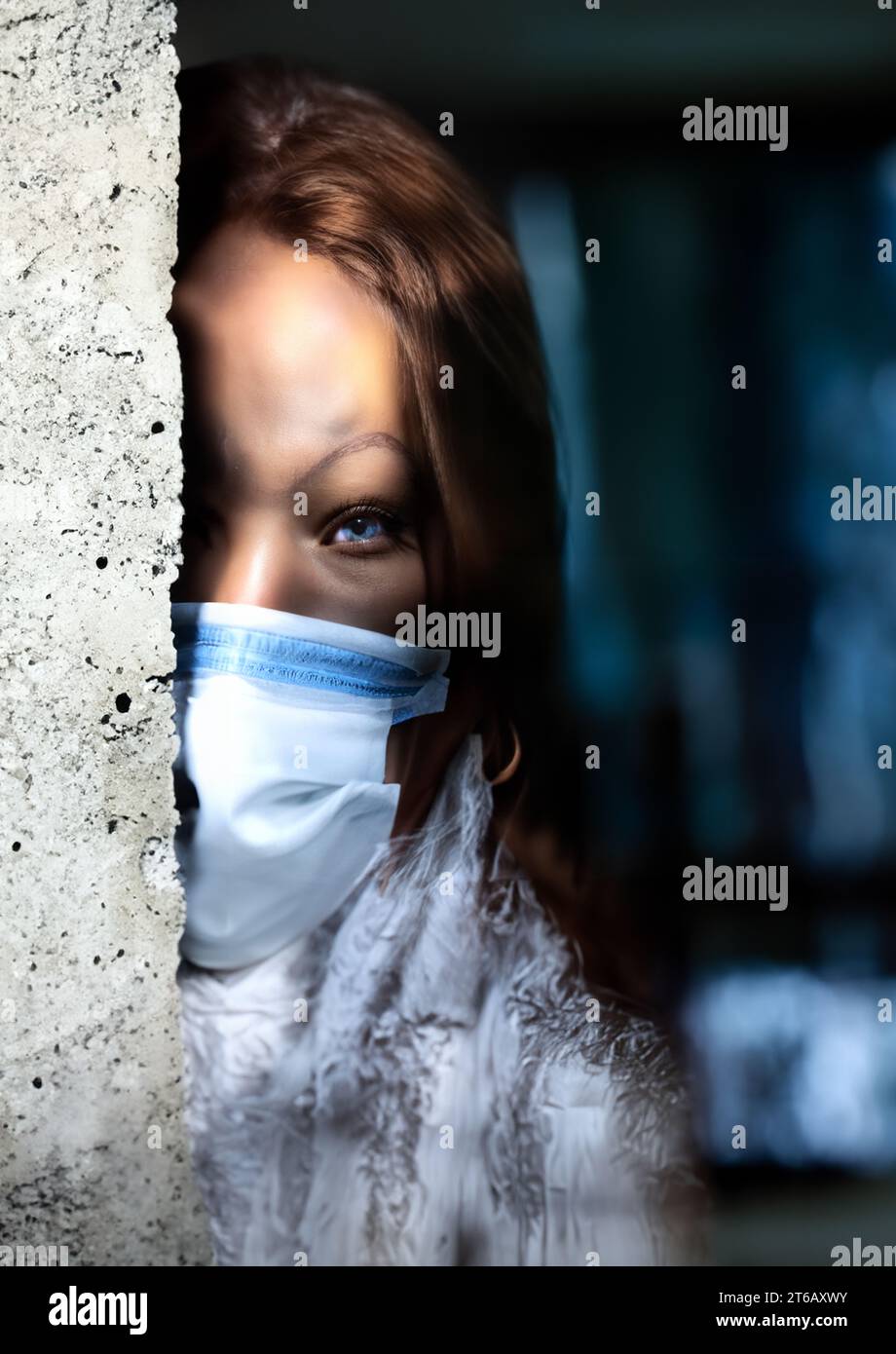 Woman eyes behind mask hi-res stock photography and images - Alamy
