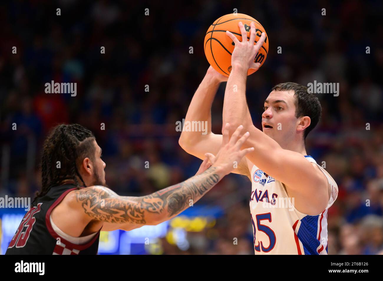 Kansas guard Nicolas Timberlake (25) looks to pass against North ...