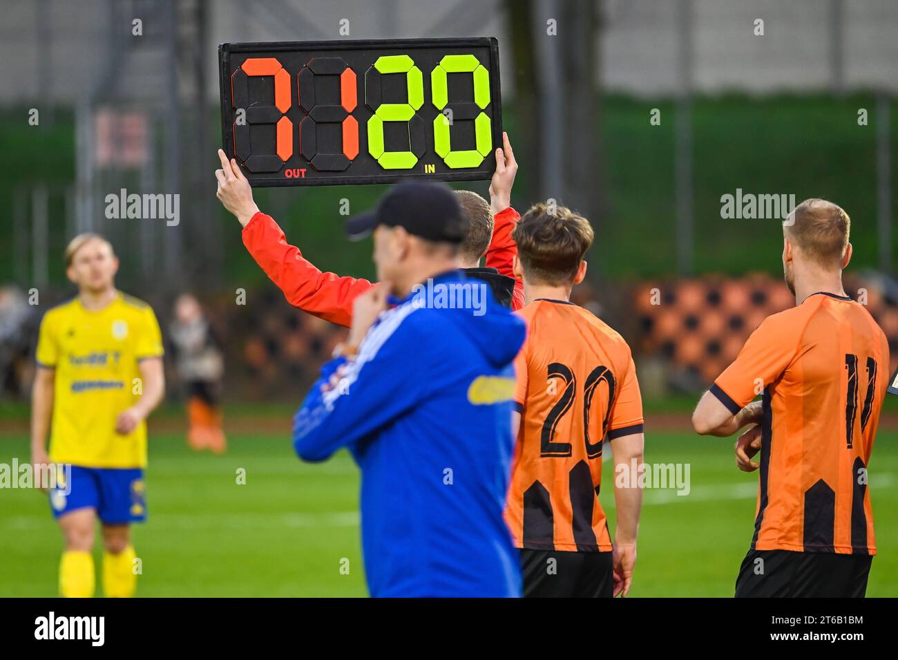 Man shows players substitution during football match Stock Photo - Alamy