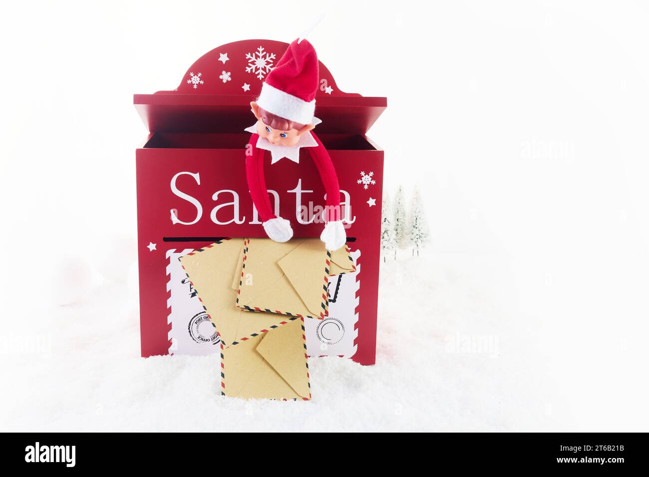 Red mailbox for Christmas mailings with letters to Santa Claus and Elf ...