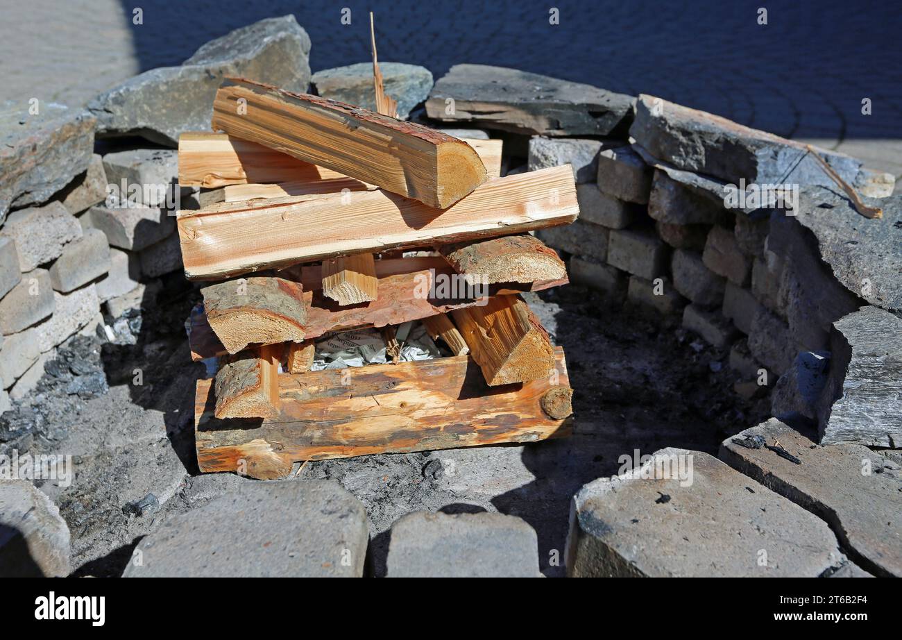 Wood stack in fireplace Stock Photo - Alamy