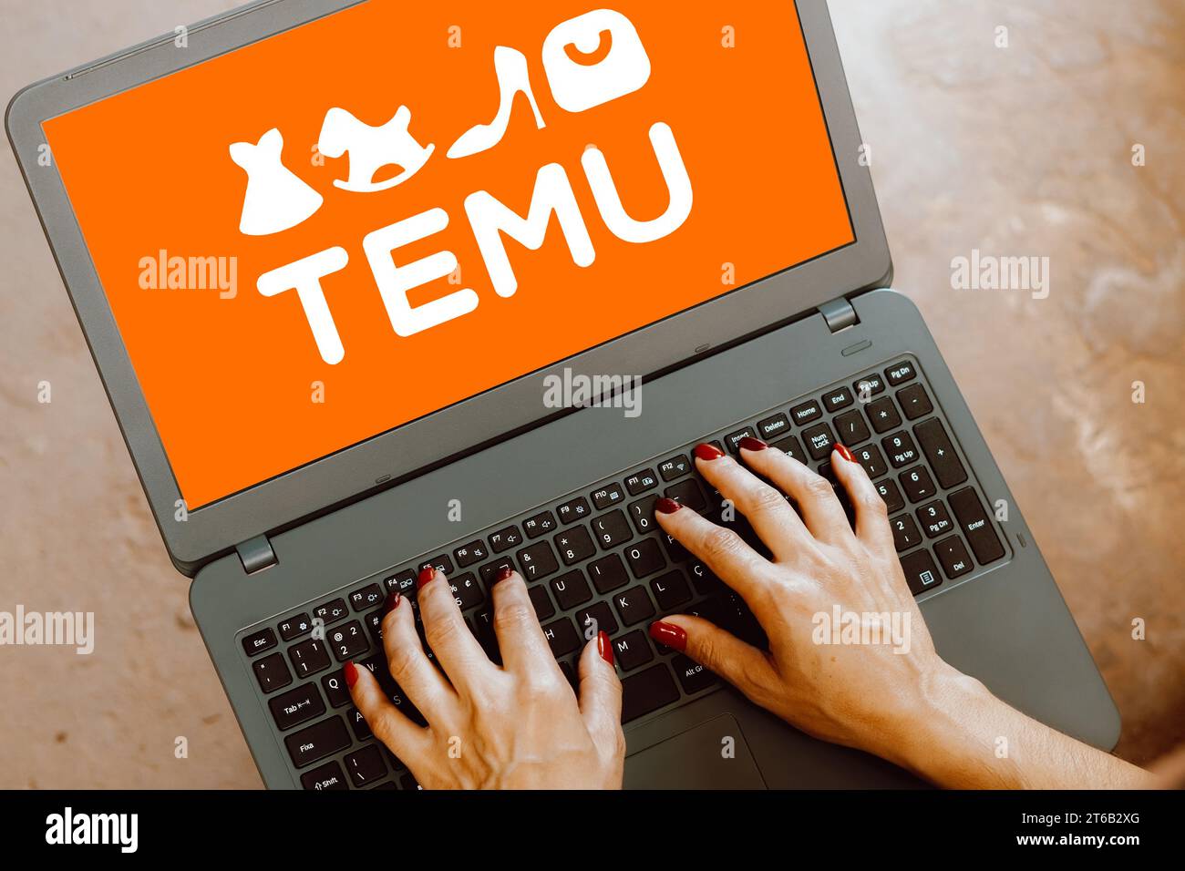 In this photo illustration, the Temu logo is displayed on a laptop ...