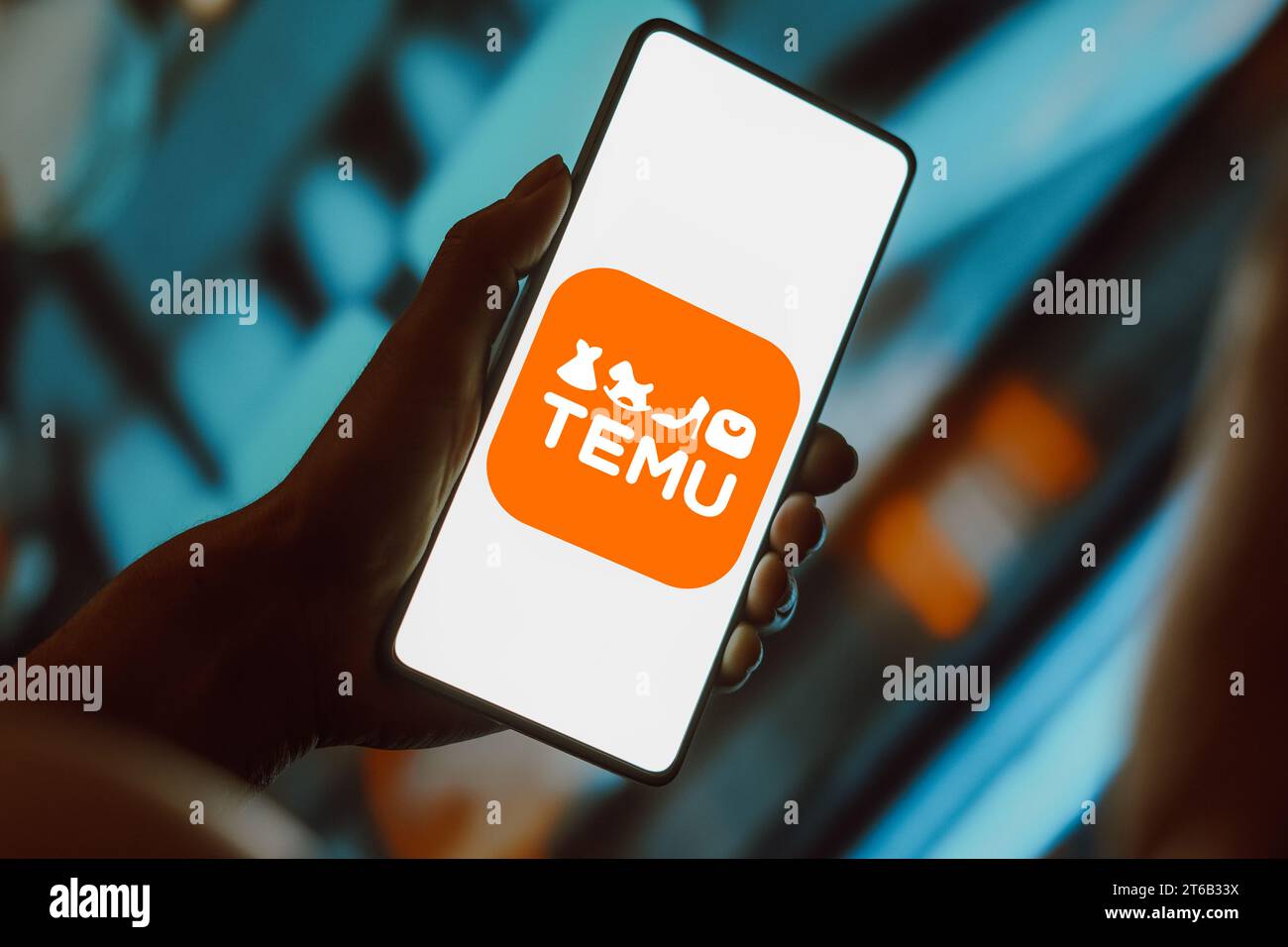 In this photo illustration, the Temu logo is displayed on a smartphone ...