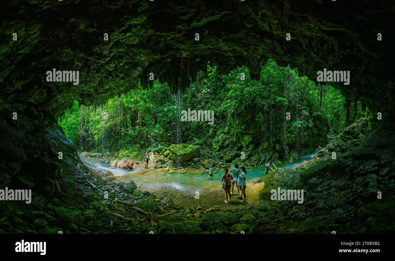 A cavern near the river where people relax Stock Photo - Alamy