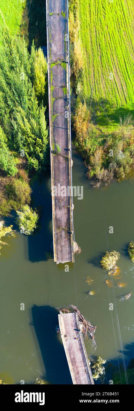 A broken bridge over the river Stock Photo - Alamy