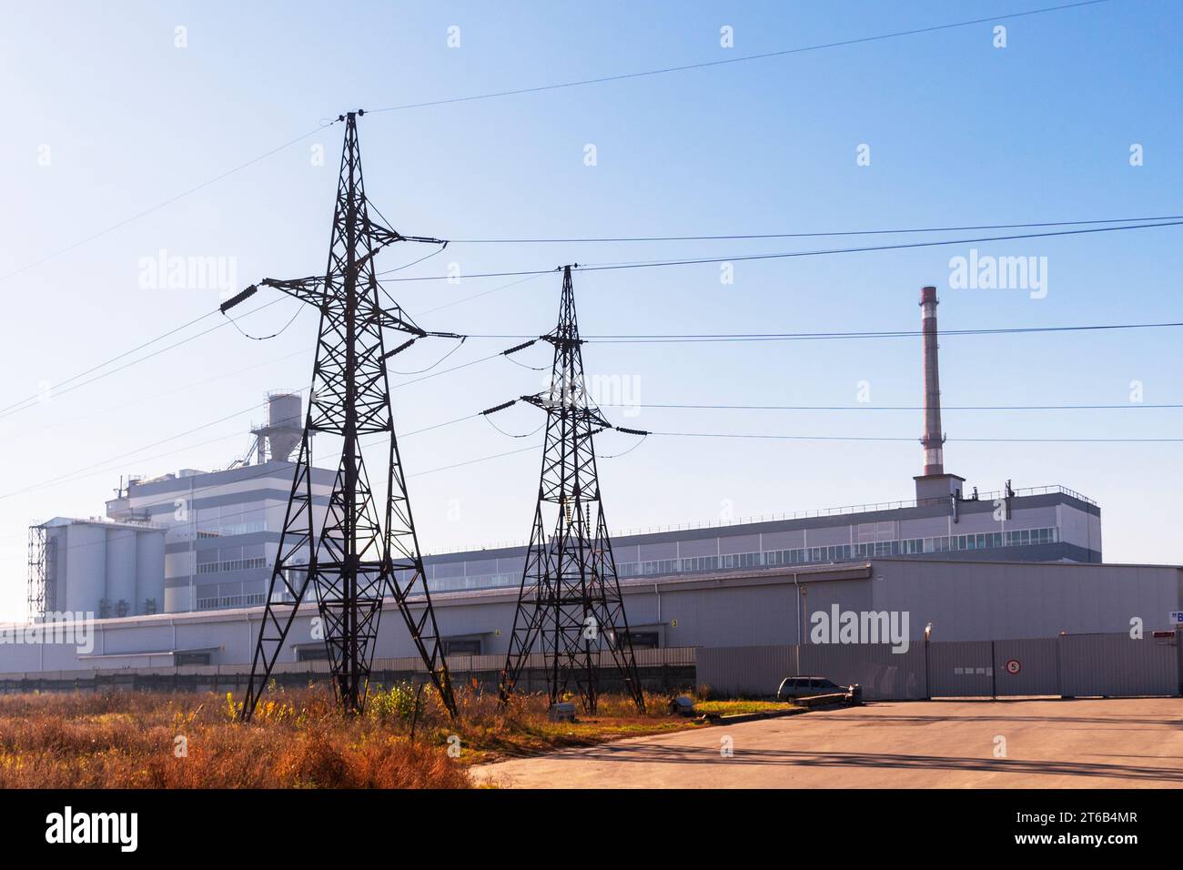 Electric pole and electric cable on the field. Power pylons and high ...