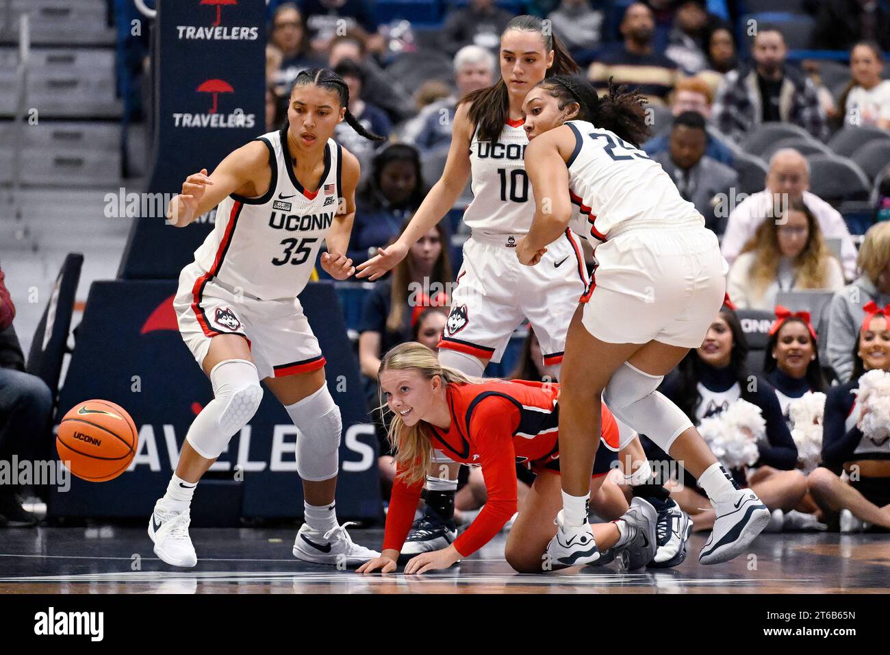 UConn guard Azzi Fudd (35), UConn guard Nika Muhl (10) and UConn ...