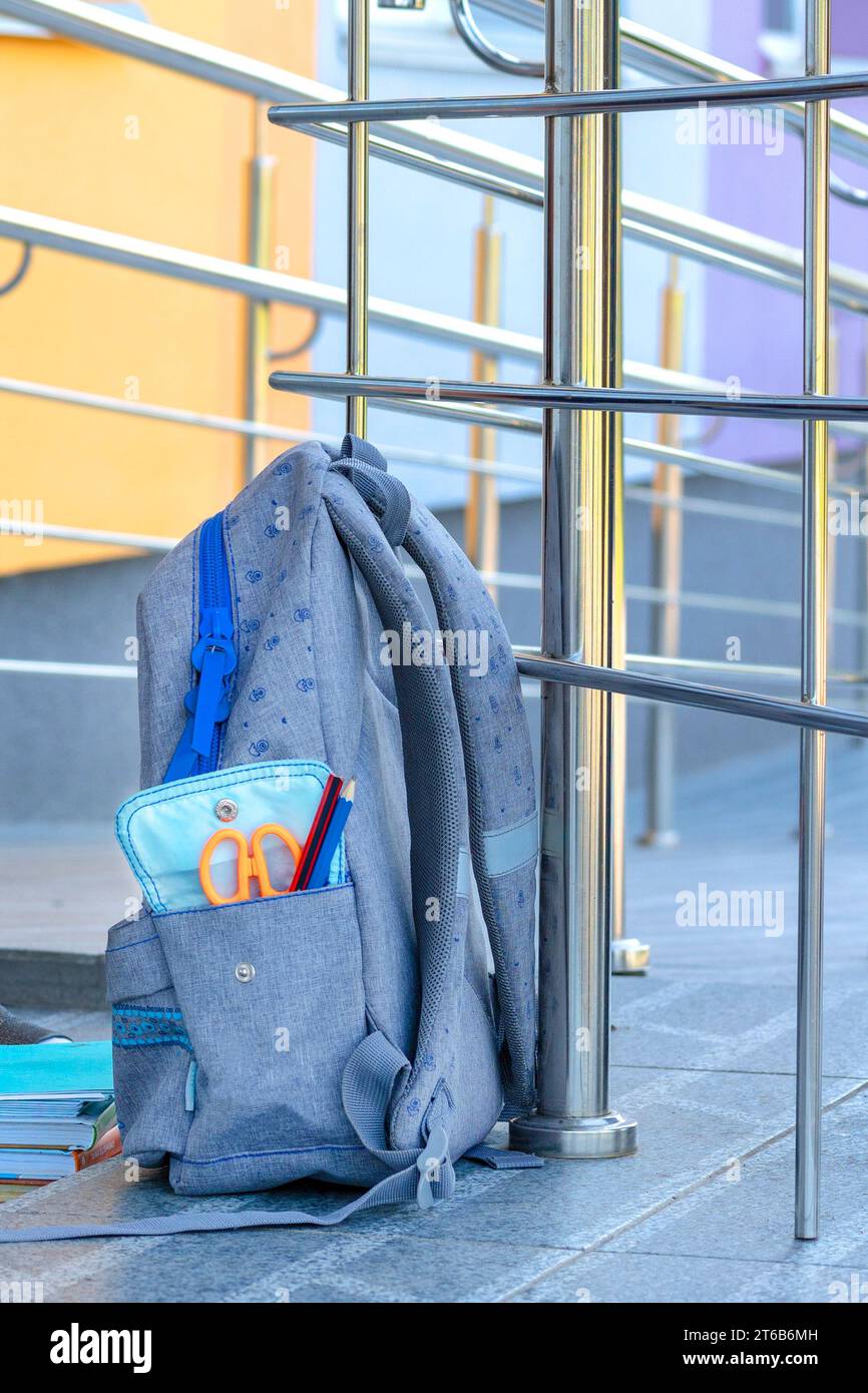 school backpack, notebooks, books close-up. supplies and objects for ...