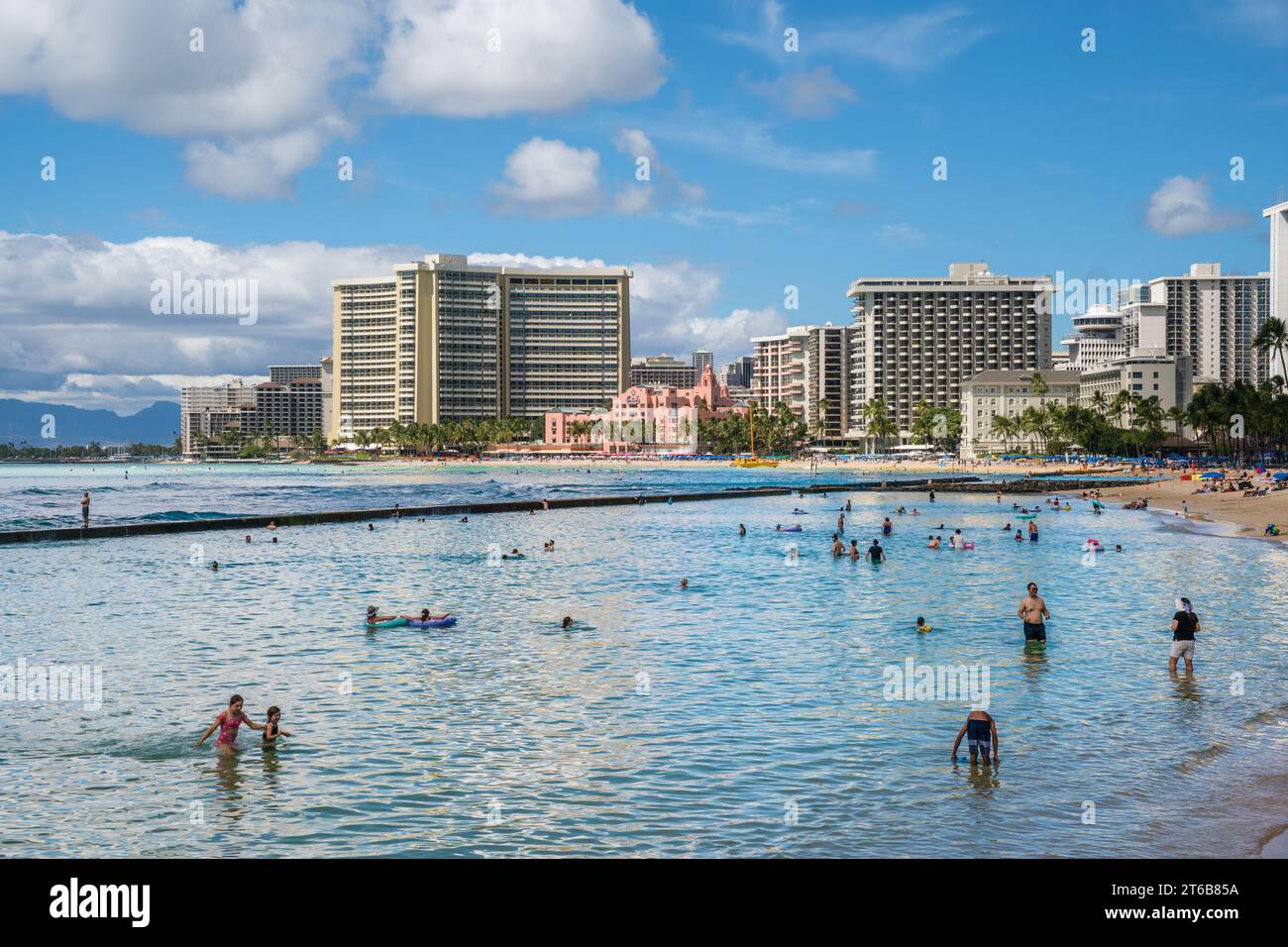 Honolulu, Oahu, HI, US-October 29, 2023: People swimming on the famous ...