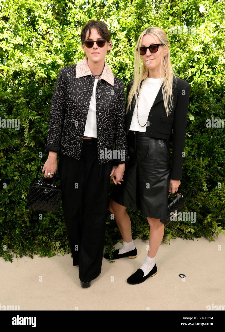 Kristen Stewart, left, and Dylan Meyer attend the Academy Women's ...