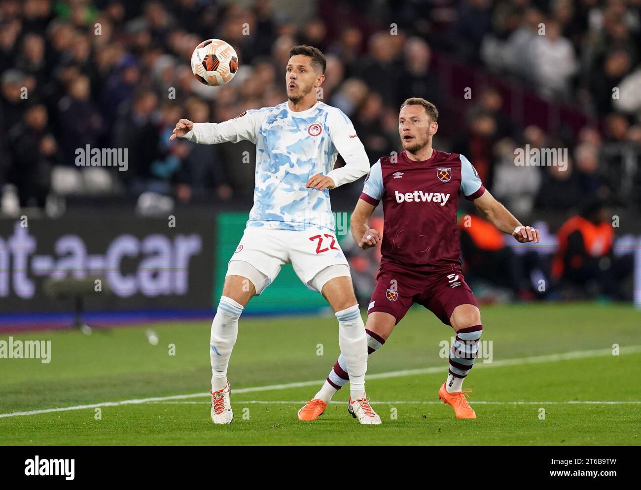 Olympiacos' Stevan Jovetic (left) and West Ham United's Vladimir Coufal ...