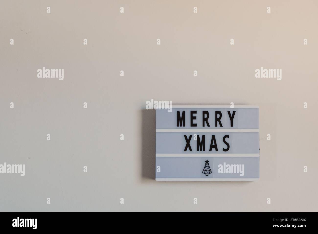 basic merry christmas sign in the wall Stock Photo - Alamy