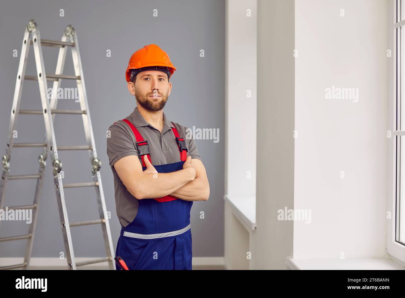 Serious confident construction worker looking hi-res stock photography ...