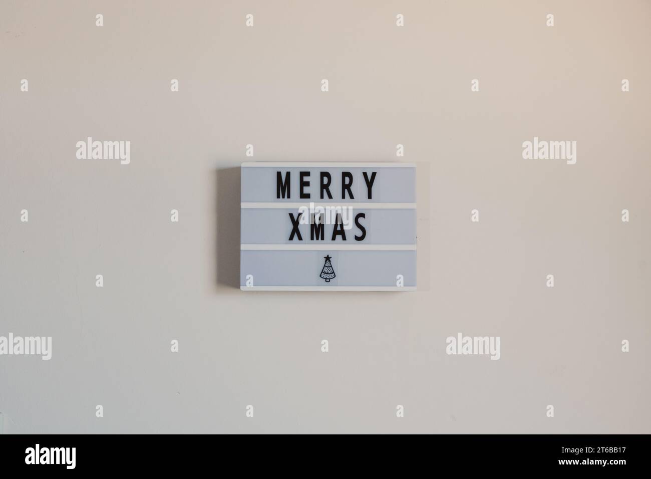minimalist sign with merry xmas writing Stock Photo - Alamy