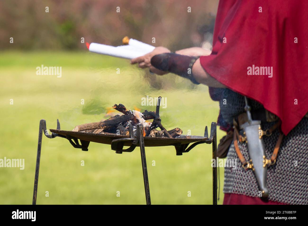 Ancient Roman sacrificial fire to the Roman gods with a Roman soldier ...