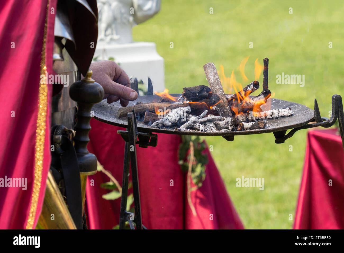 Ancient Roman sacrificial fire to the Roman gods with a Roman soldier ...