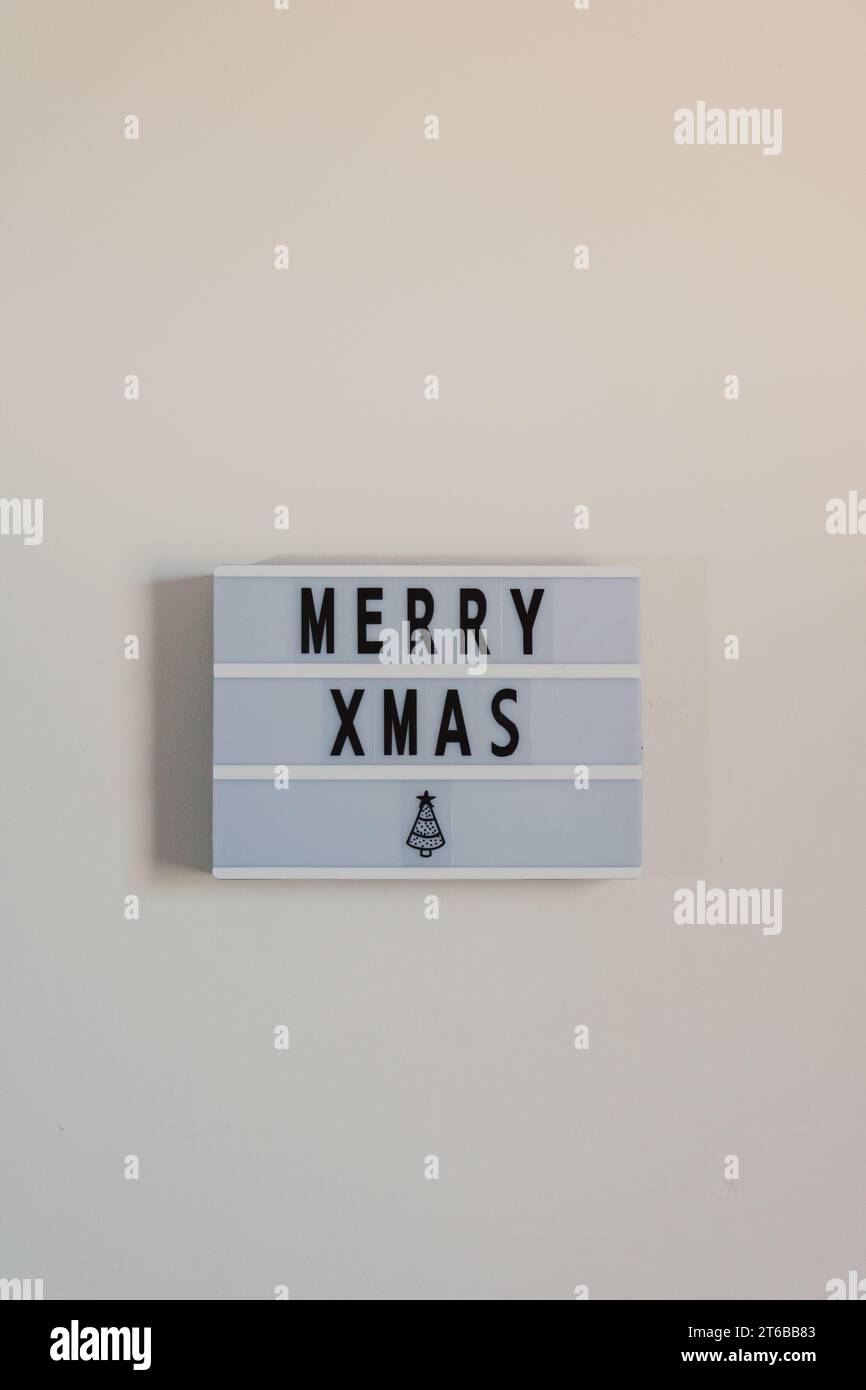 simple merry christmas sign in the wall Stock Photo - Alamy
