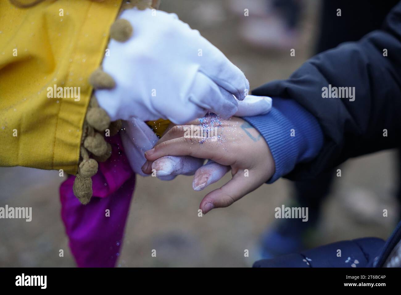 child's hand receiving blue magic fairy dust. children's religious ...