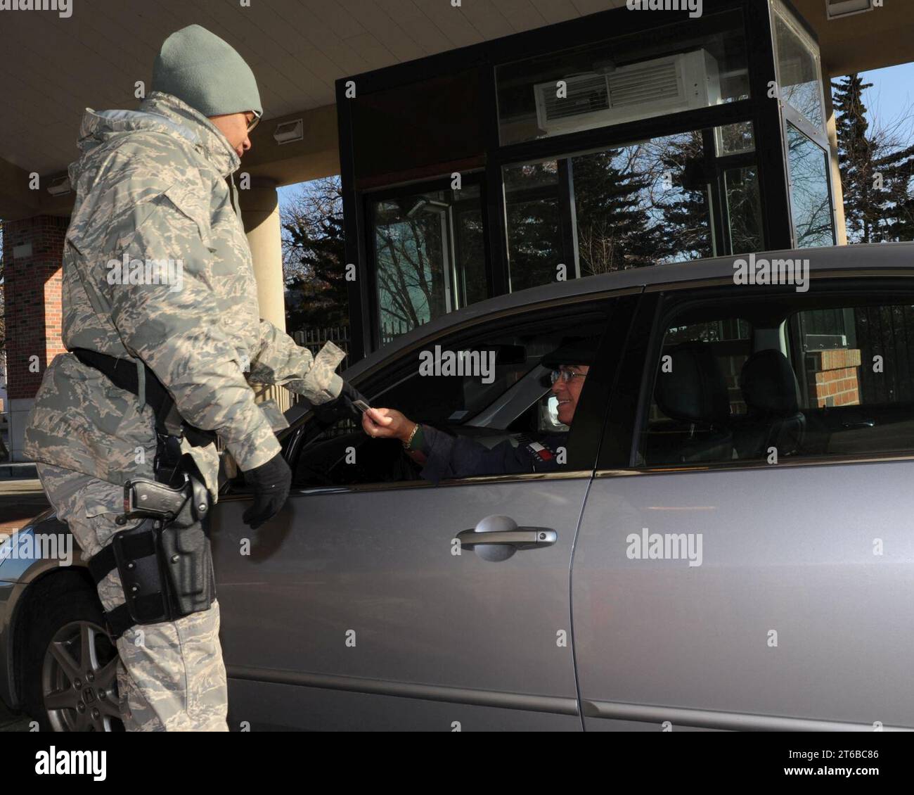 US soldier checking car identification at checkpoint Stock Photo - Alamy
