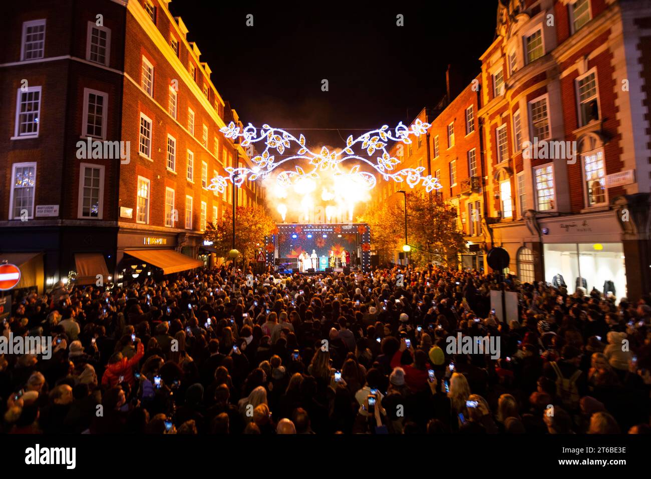 EDITORIAL USE ONLY Members of the public watch the Merry Marylebone ...