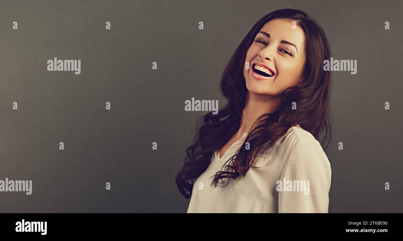 Pretty Young Toothy Enjoying Laughing Woman With Long Brown Healthy