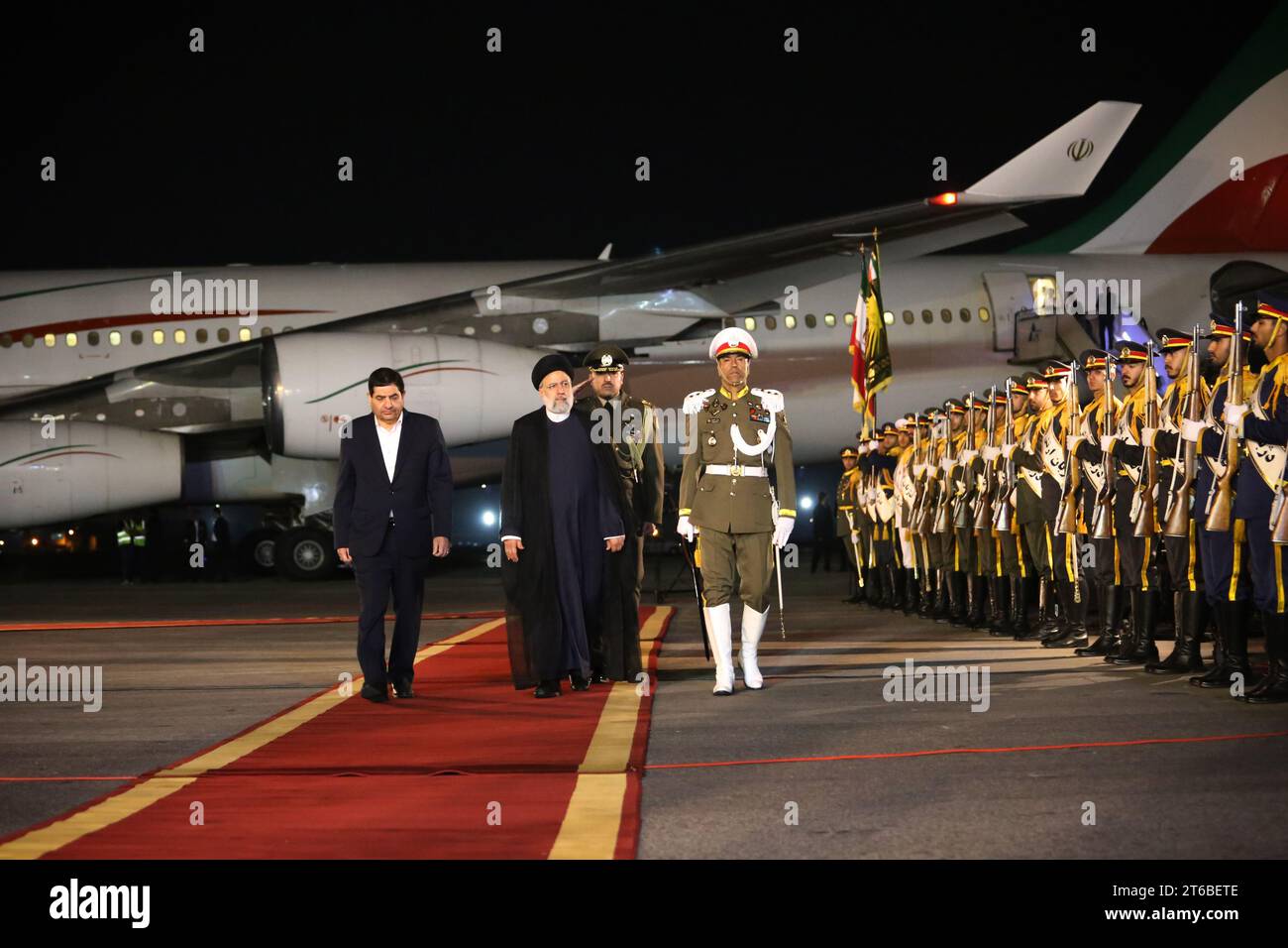Tehran, Iran. 9th Nov, 2023. Iranian President EBRAHIM RAISI (2L) walks ...